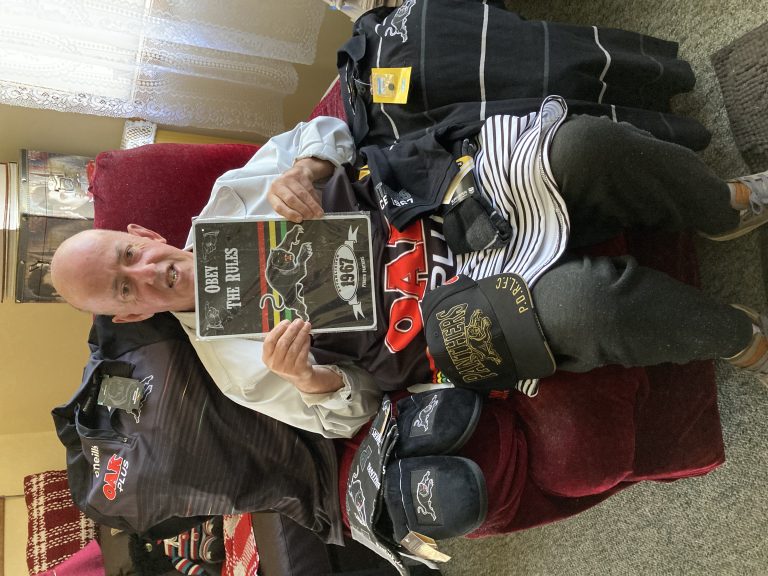 Brett with his Panther's merch - Zest Care